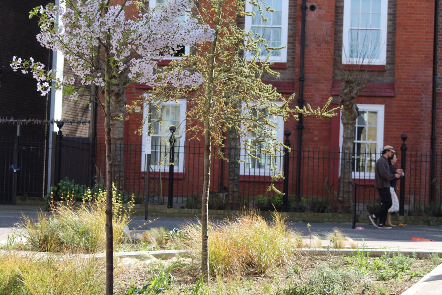 How do Pocket Parks and Nature Gardens Help Manage Urban Flooding?