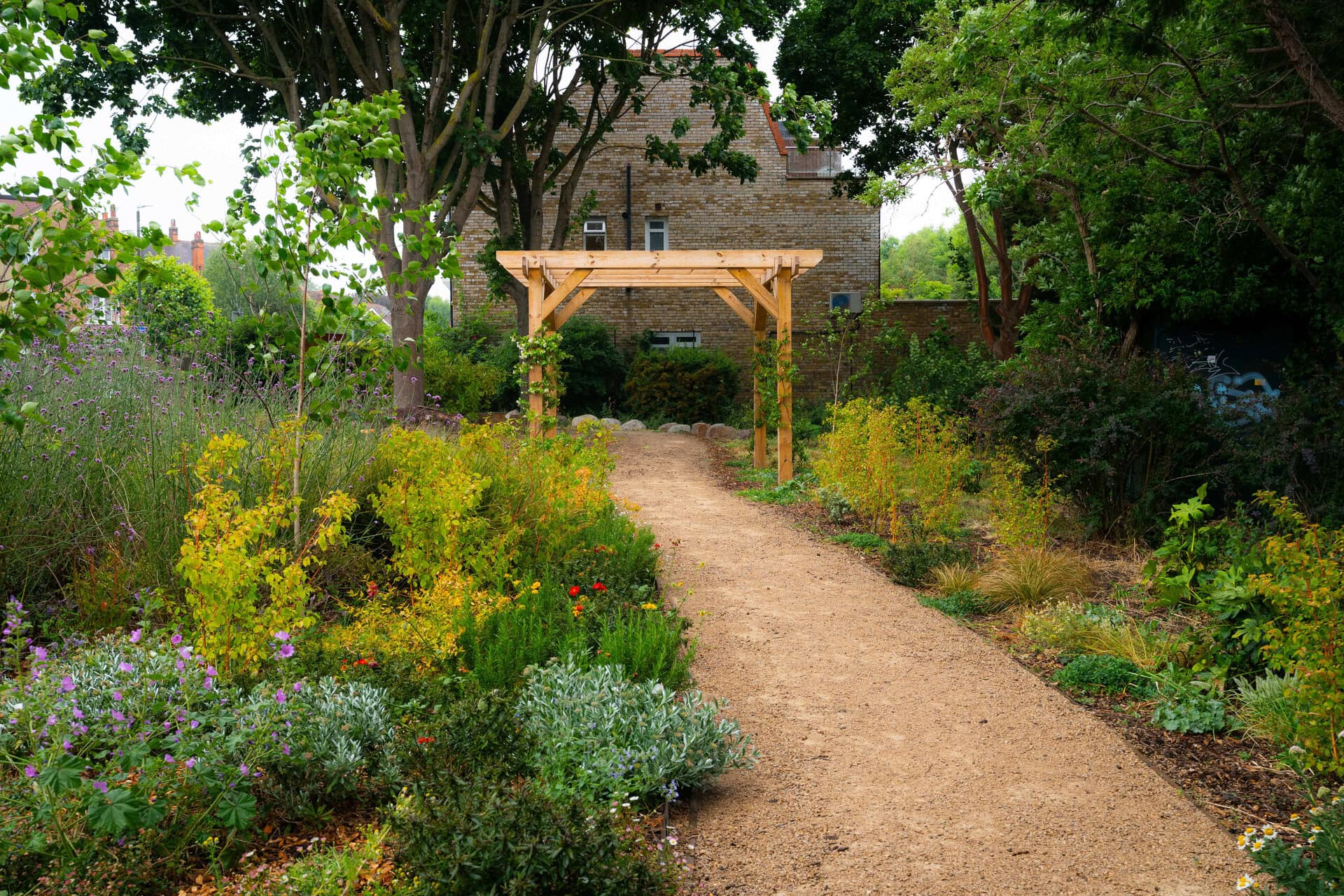 How do Pocket Parks and Nature Gardens Help Manage Urban Flooding?